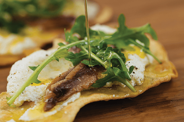 Carta di Musica with Ricotta, Arugula, and Anchovy – Corto Olive Oil